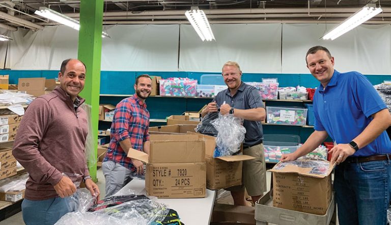 Schauer team dedicates more than 100 hours of service to Shoes and ...